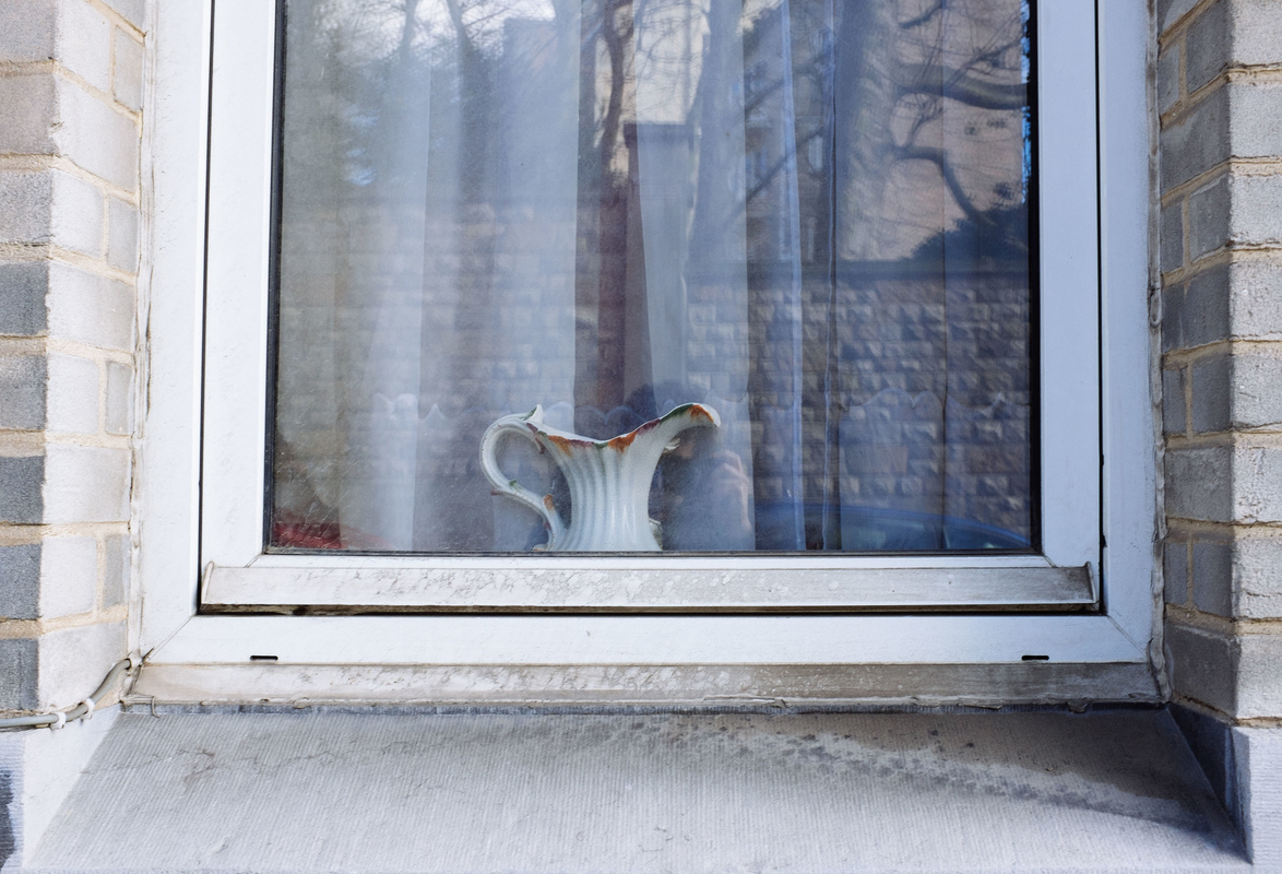 Behind Belgian Windows