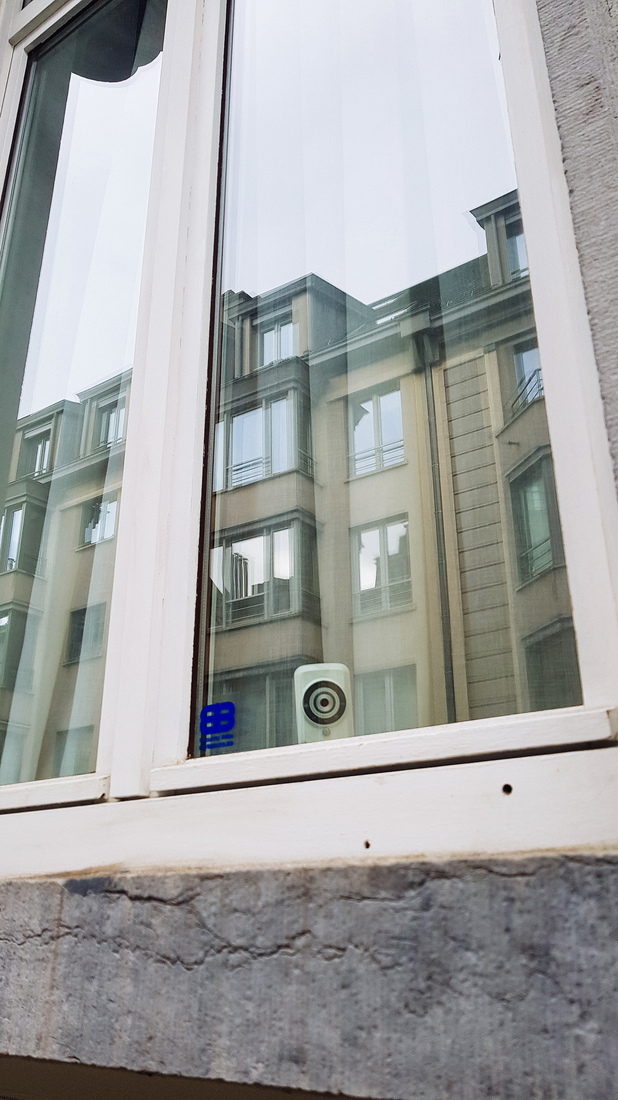 Behind Belgian Windows